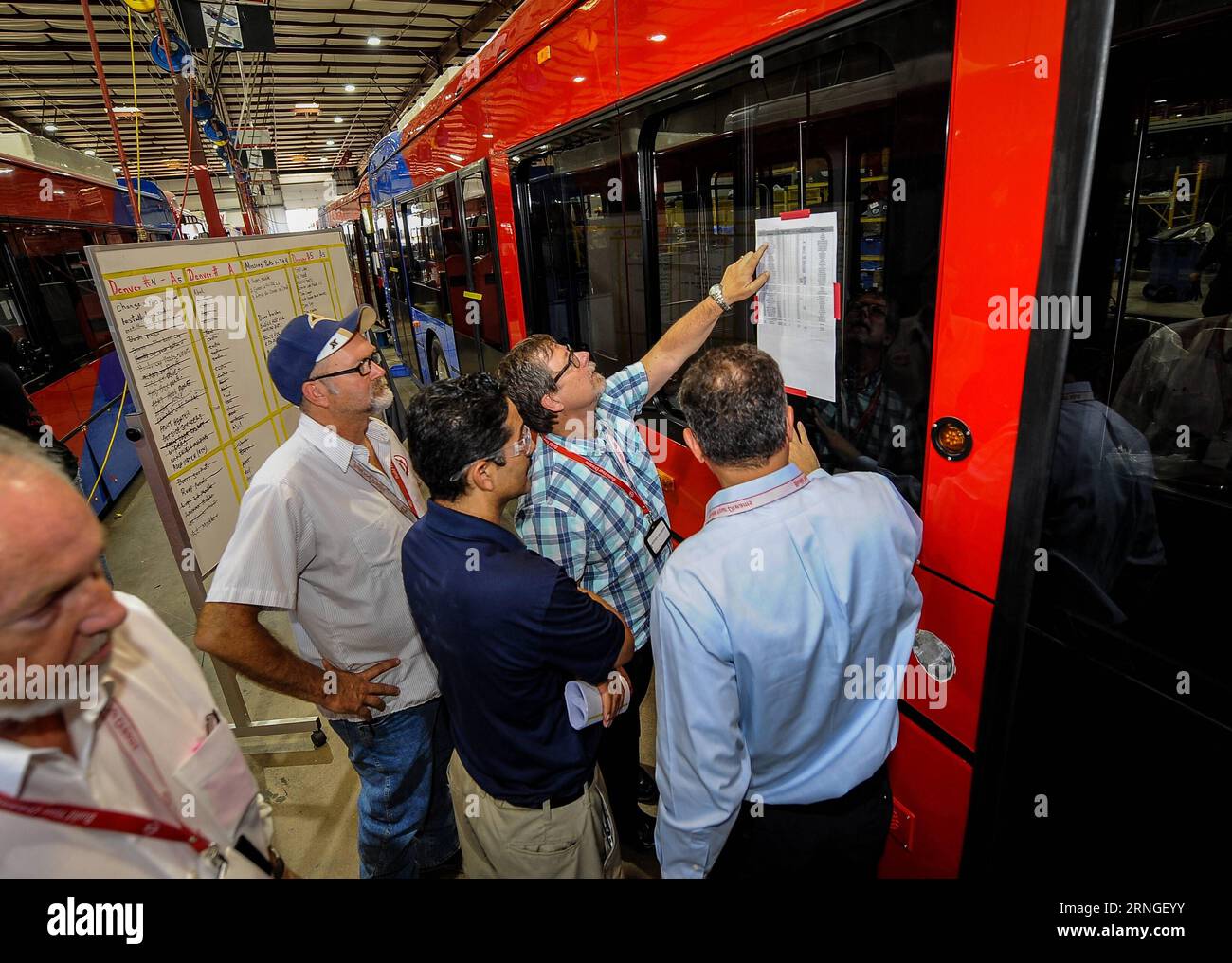 (160925) -- LANCASTER, Sept. 25, 2016 -- People work at a BYD electric ...