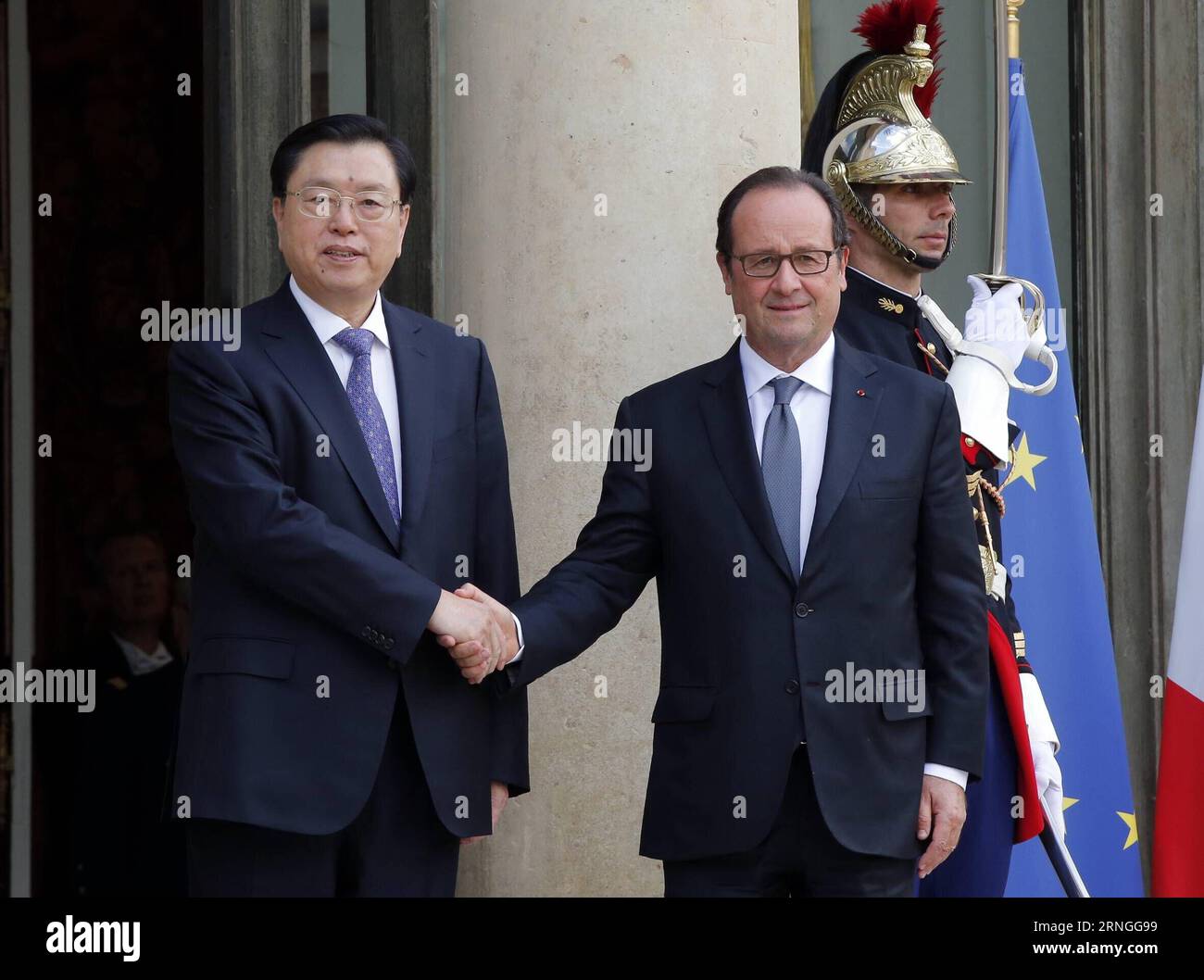 Zhang Dejiang (L), chairman of the Standing Committee of China s ...