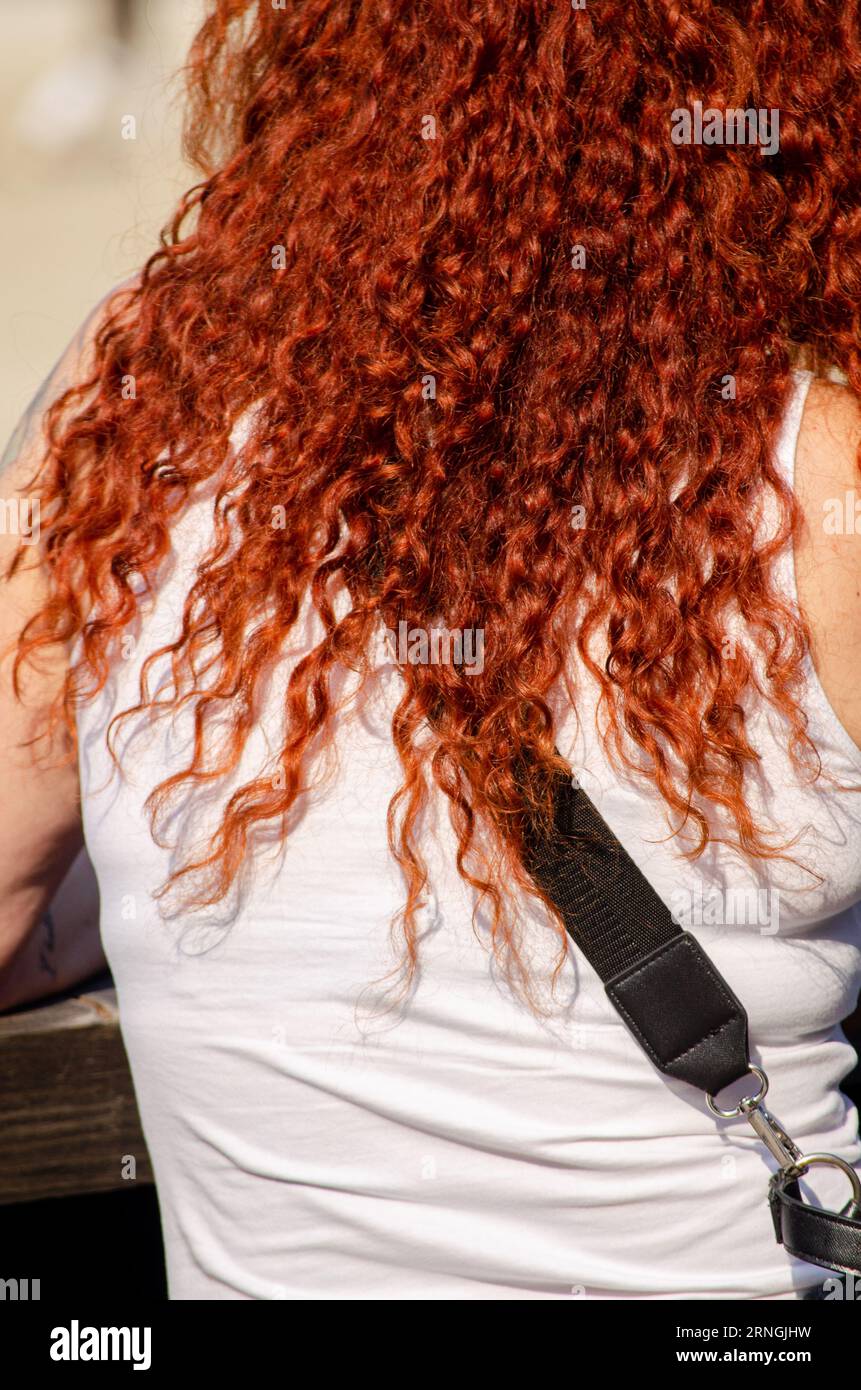 Long curly red hair back hi-res stock photography and images - Alamy