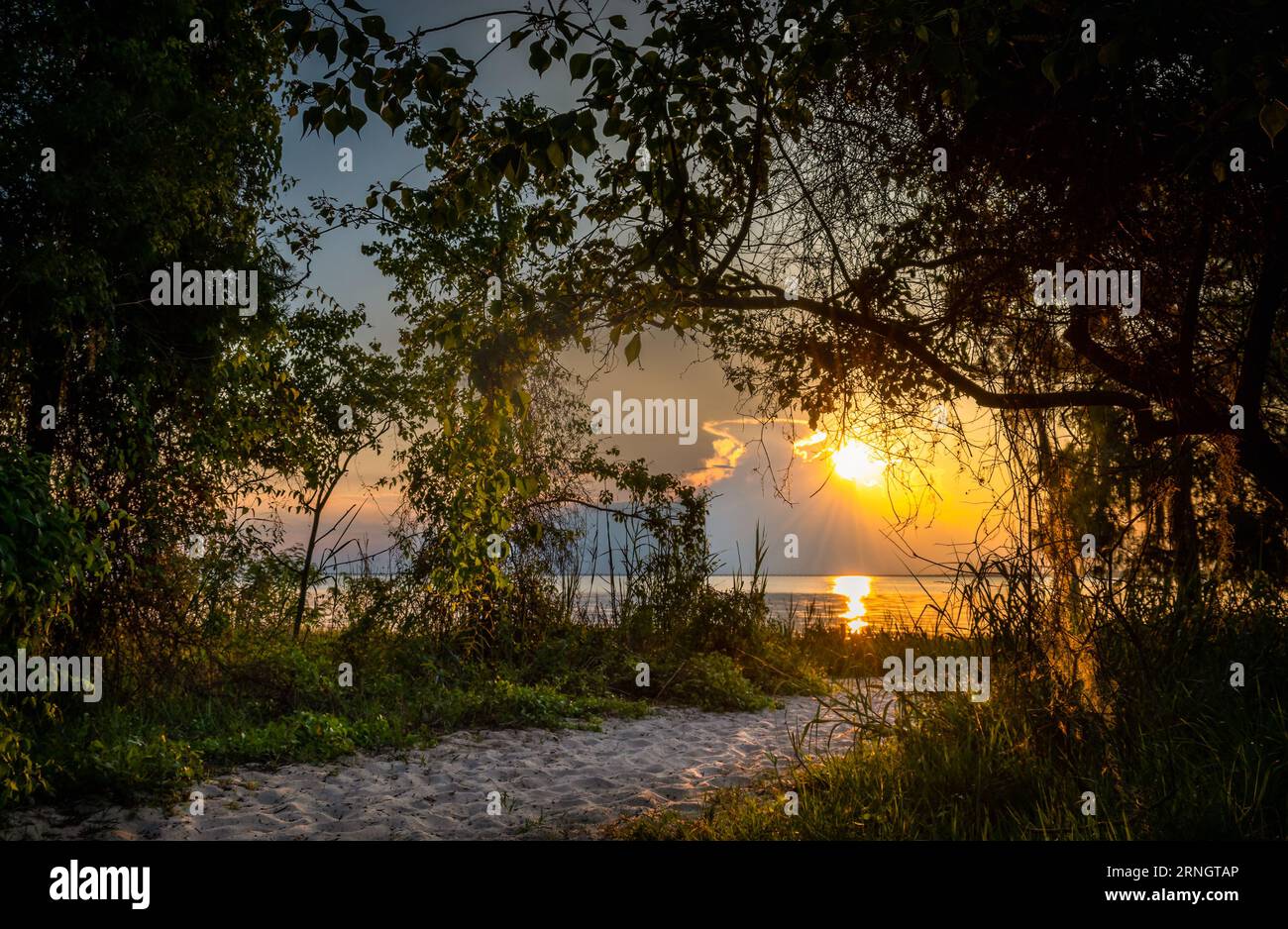 Beach trail to Sunset Stock Photo - Alamy