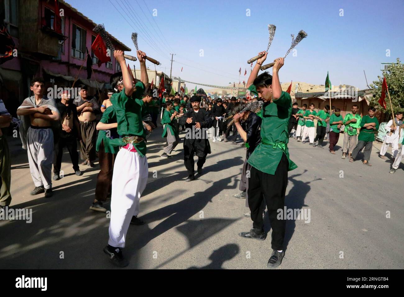 -- GHAZNI, Oct. 12, 2016 -- Afghan mourners flagellate themselves ...