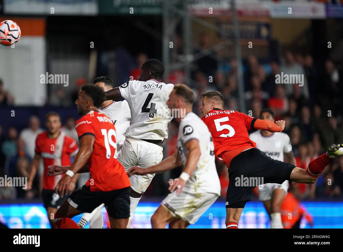 Luton Town's Mads Juel Andersen (right) scores their side's first goal ...