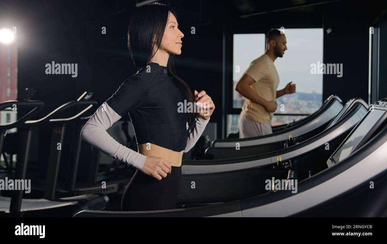 Woman going on treadmill gym hi-res stock photography and images - Alamy
