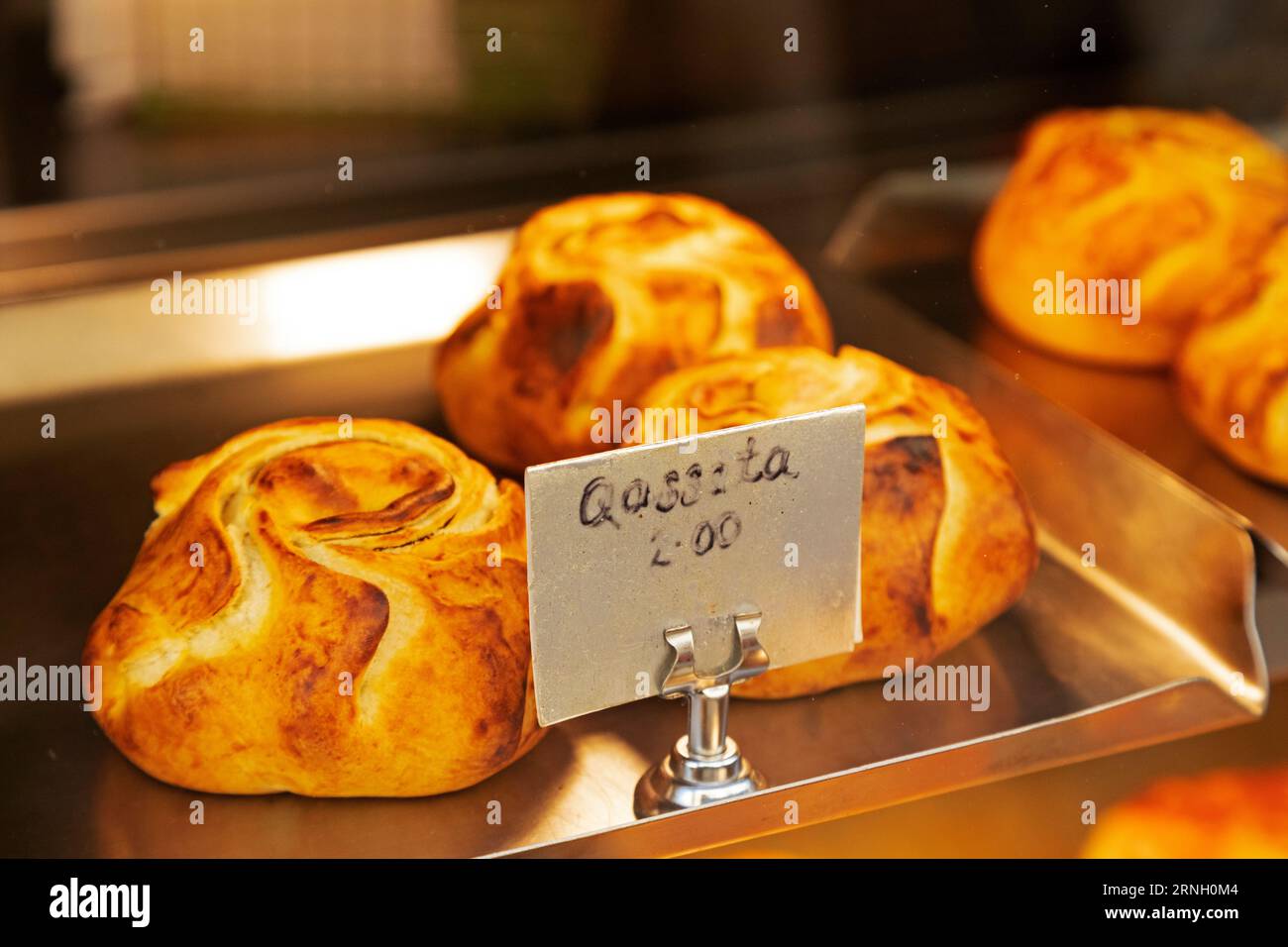 Quassata for sale at a baker's shop in Valletta, Malta. The dish is a ...