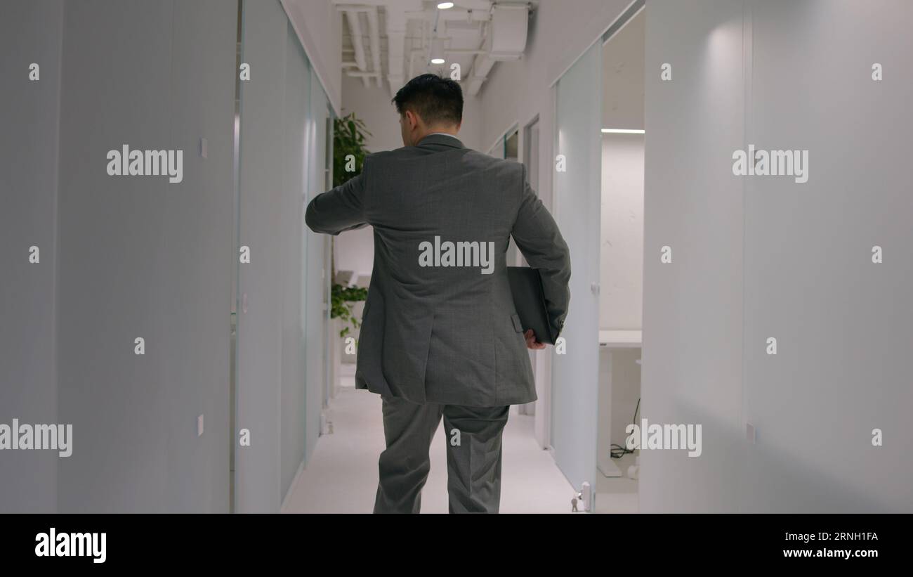 Back view unknown businessman entrepreneur ceo employer hurry run on ...