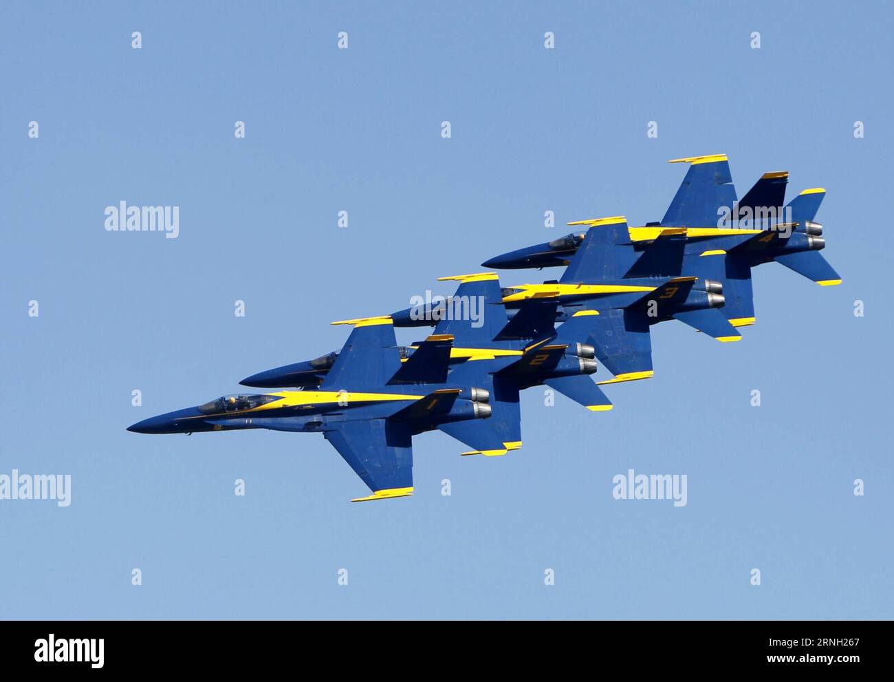 A formation of U.S. Navy Blue Angles performs during the Houston ...