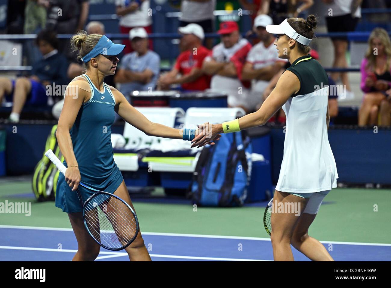 Magda Linette and Bernarda Pera celebrate during a women's doubles ...