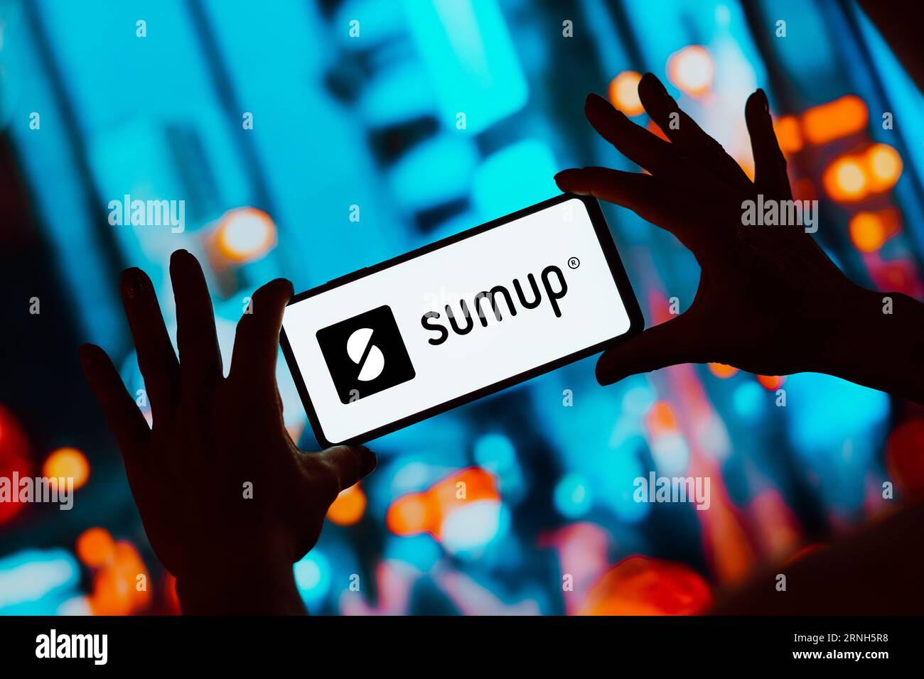 In this photo illustration, the Sumup logo is displayed on a smartphone ...