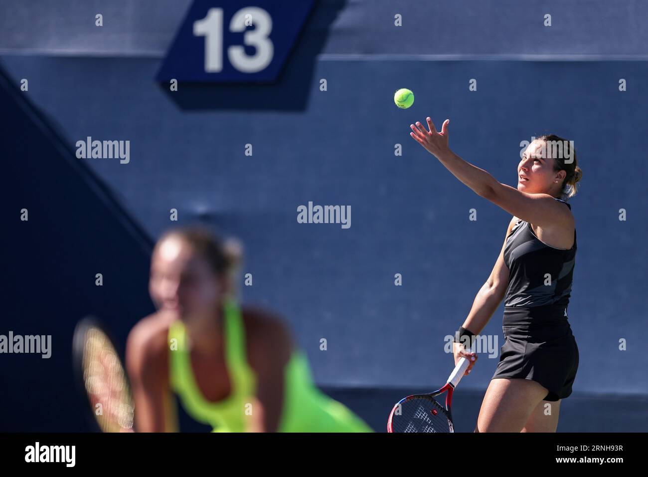 Marta Kostyuk and Elena-Gabriela Ruse in action during a women's ...