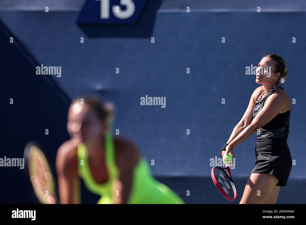 Marta Kostyuk and Elena-Gabriela Ruse in action during a women's ...