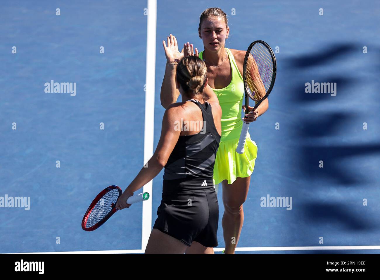 Marta Kostyuk and Elena-Gabriela Ruse in action during a women's ...