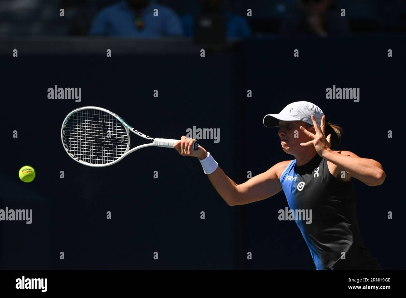 Iga Swiatek in action during a women's singles match at the 2023 US ...