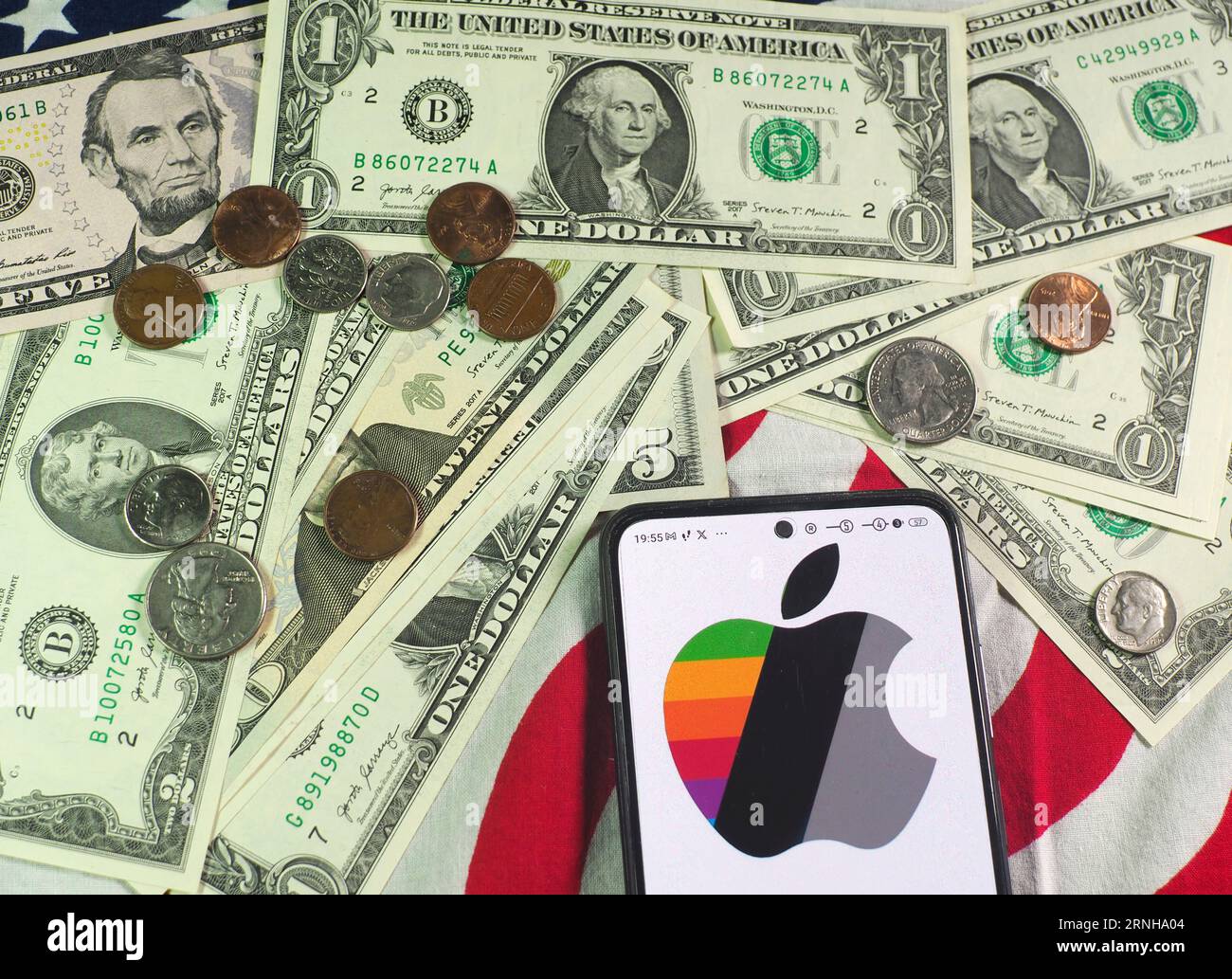 In this photo illustration, Apple Inc. logo is seen displayed on a ...