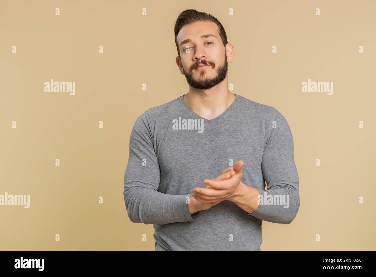Well done good job. Lebanese young man showing thumbs up and nodding in ...