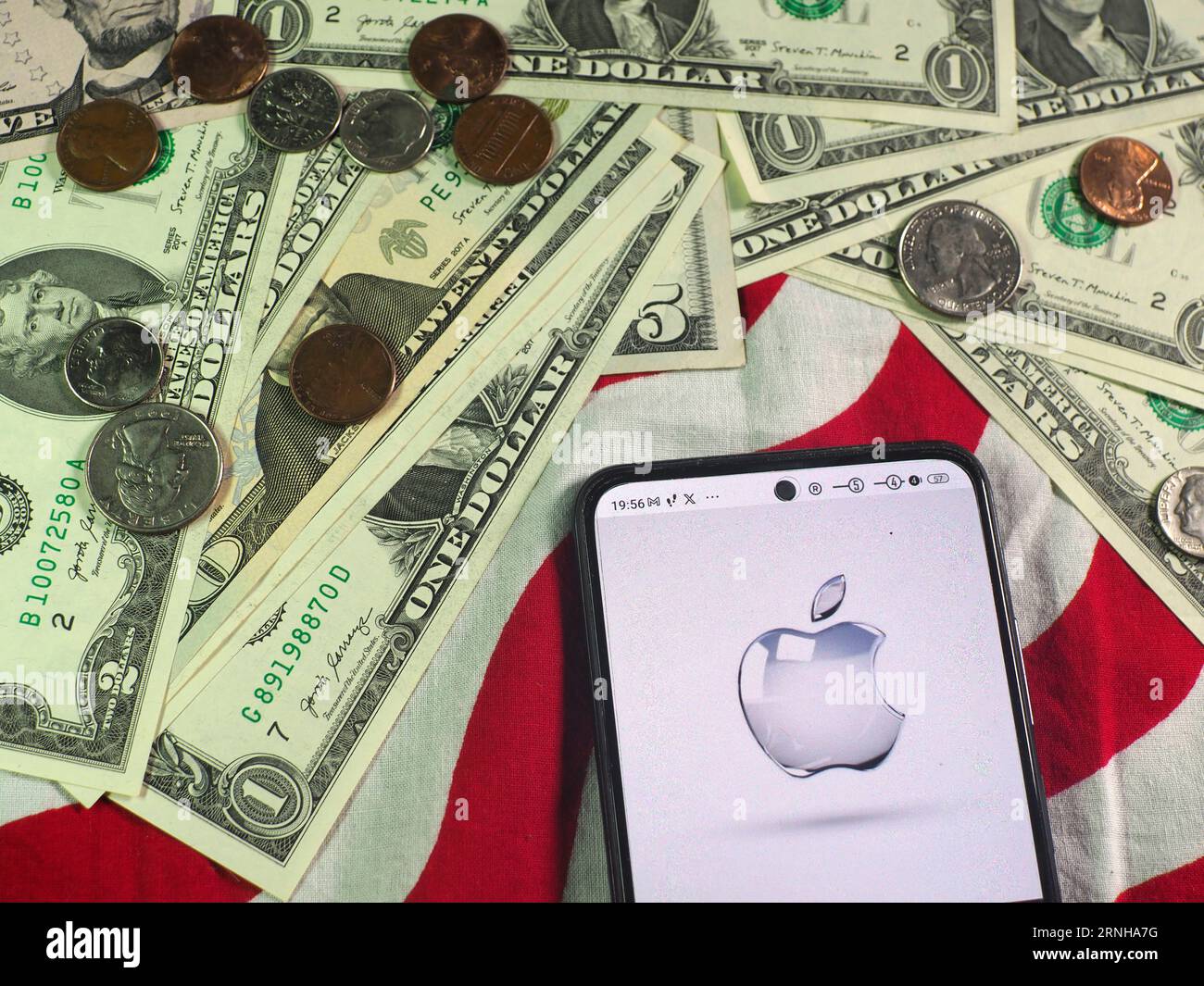 In this photo illustration, Apple Inc. logo is seen displayed on a ...