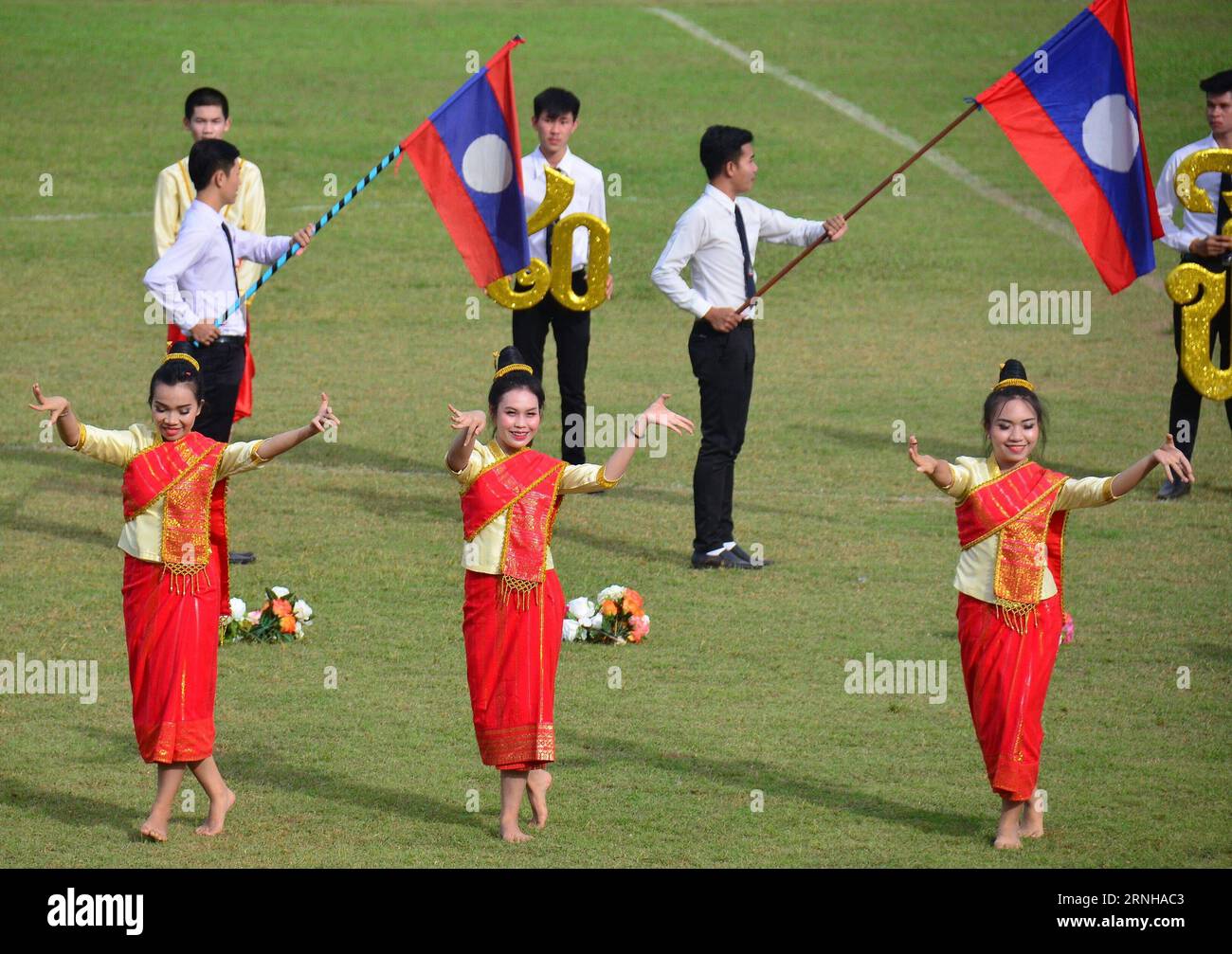 VIENTIANE, Students from the National University of Laos (NUOL) perform ...