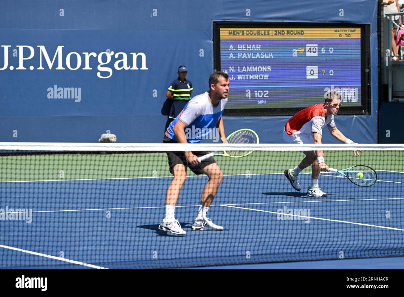 Adam Pavlasek and Ariel Behar in action during a men's doubles match at ...