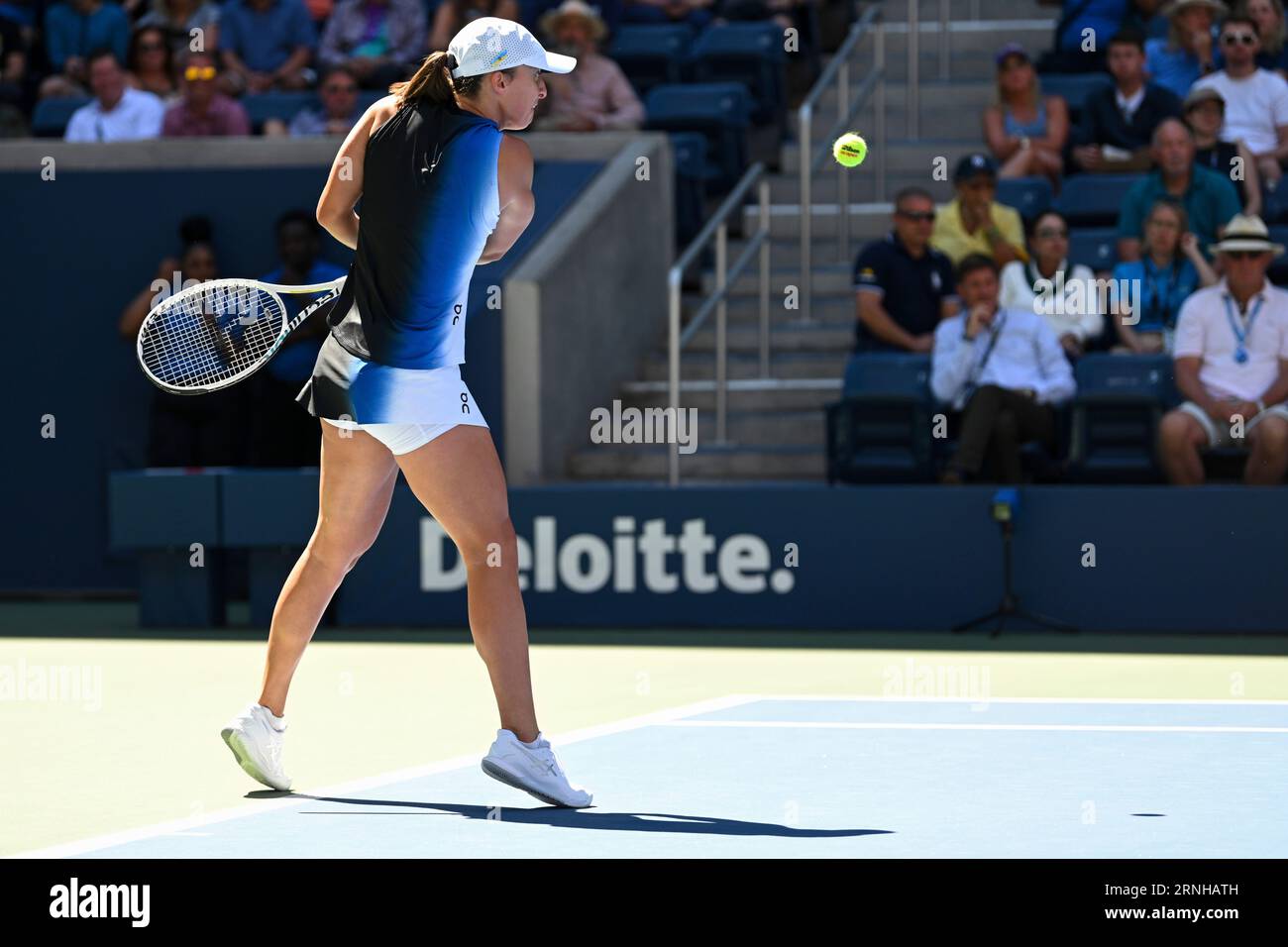 Iga Swiatek in action during a women's singles match at the 2023 US ...