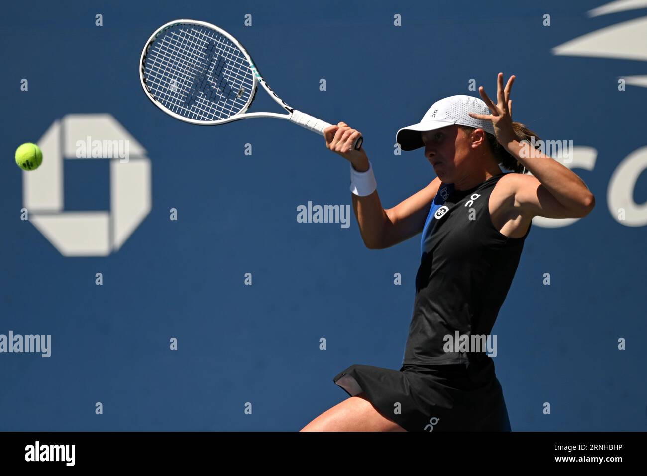 Iga Swiatek in action during a women's singles match at the 2023 US ...