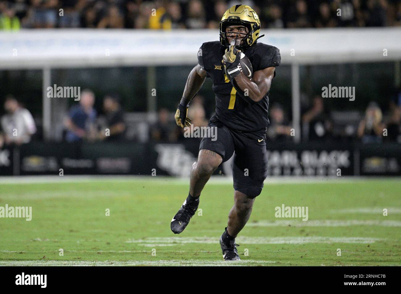 Central Florida running back RJ Harvey (7) rushes for a 48-yard ...