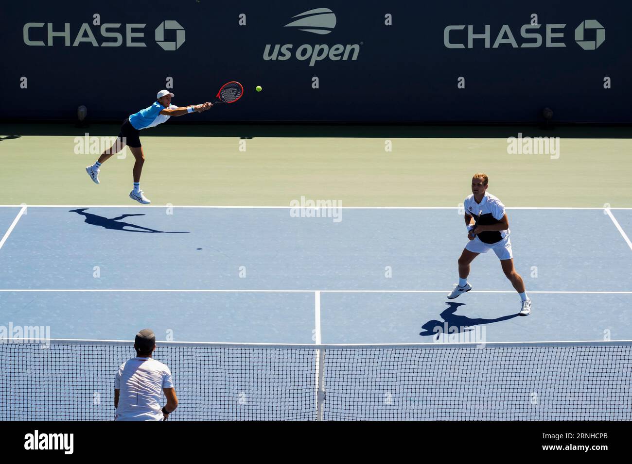 Bart Stevens and Matteo Arnaldi in action during a men's doubles match ...