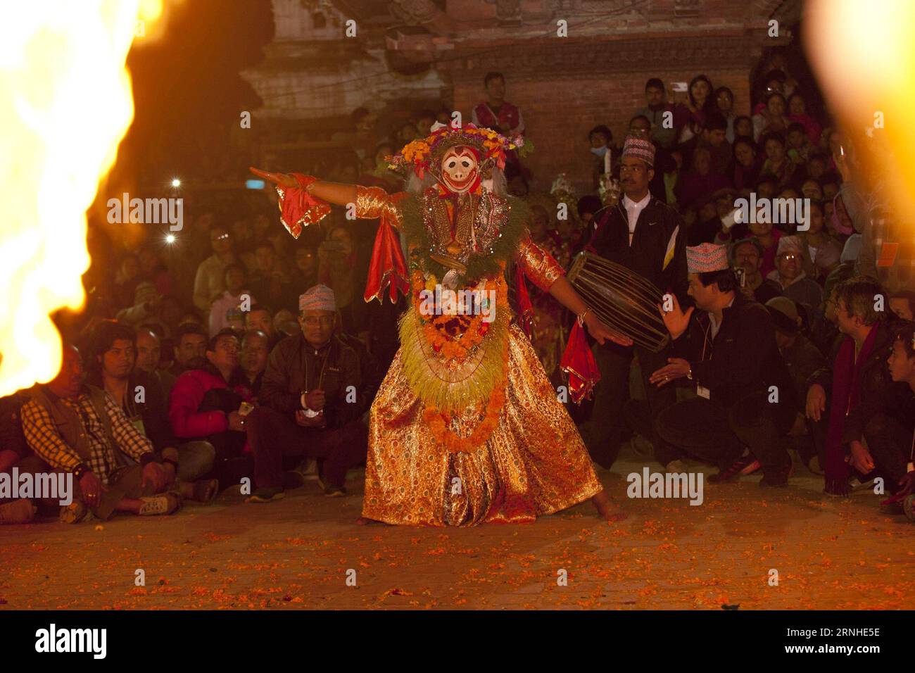 A Nepalese man dressed as Hindu god Narsingh performs during the Kartik ...