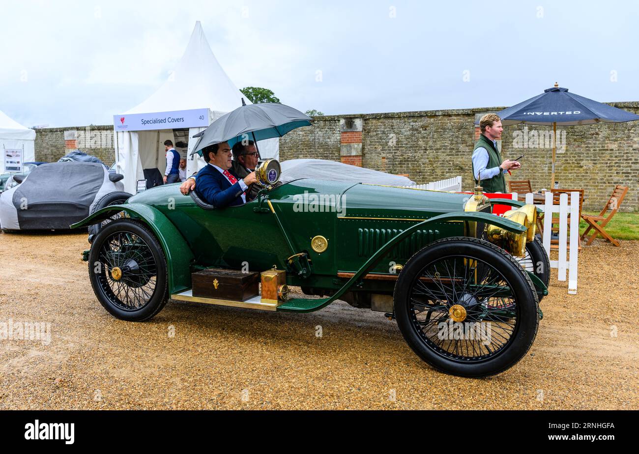 Even the drizzle fails to dampen the spirts of the drivers of Cars ...