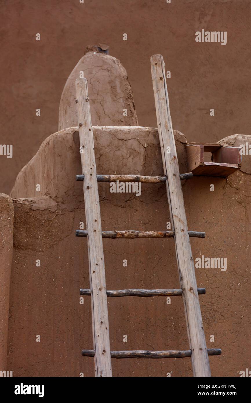 Traditional ladder at the Taos Pueblo built by the Tiwa tribe and is ...