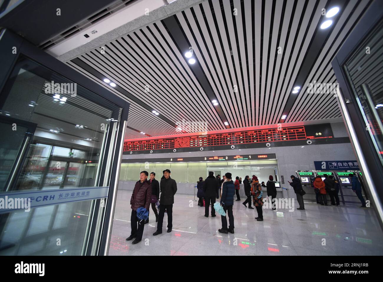 Passengers prepare to take trains at the Changsha Station of the ...