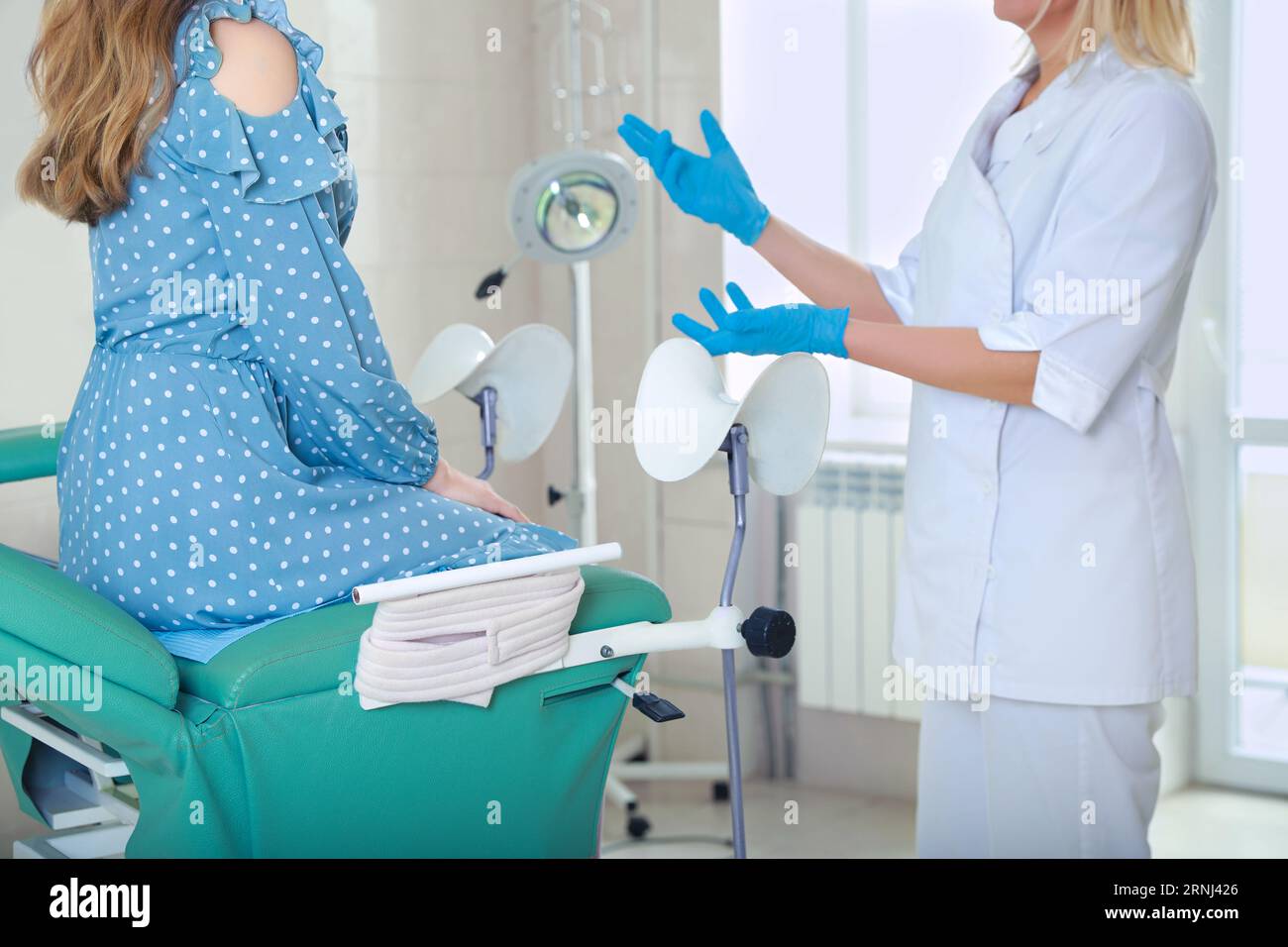 Woman having appointment with gynecologist in clinic. Patient ...