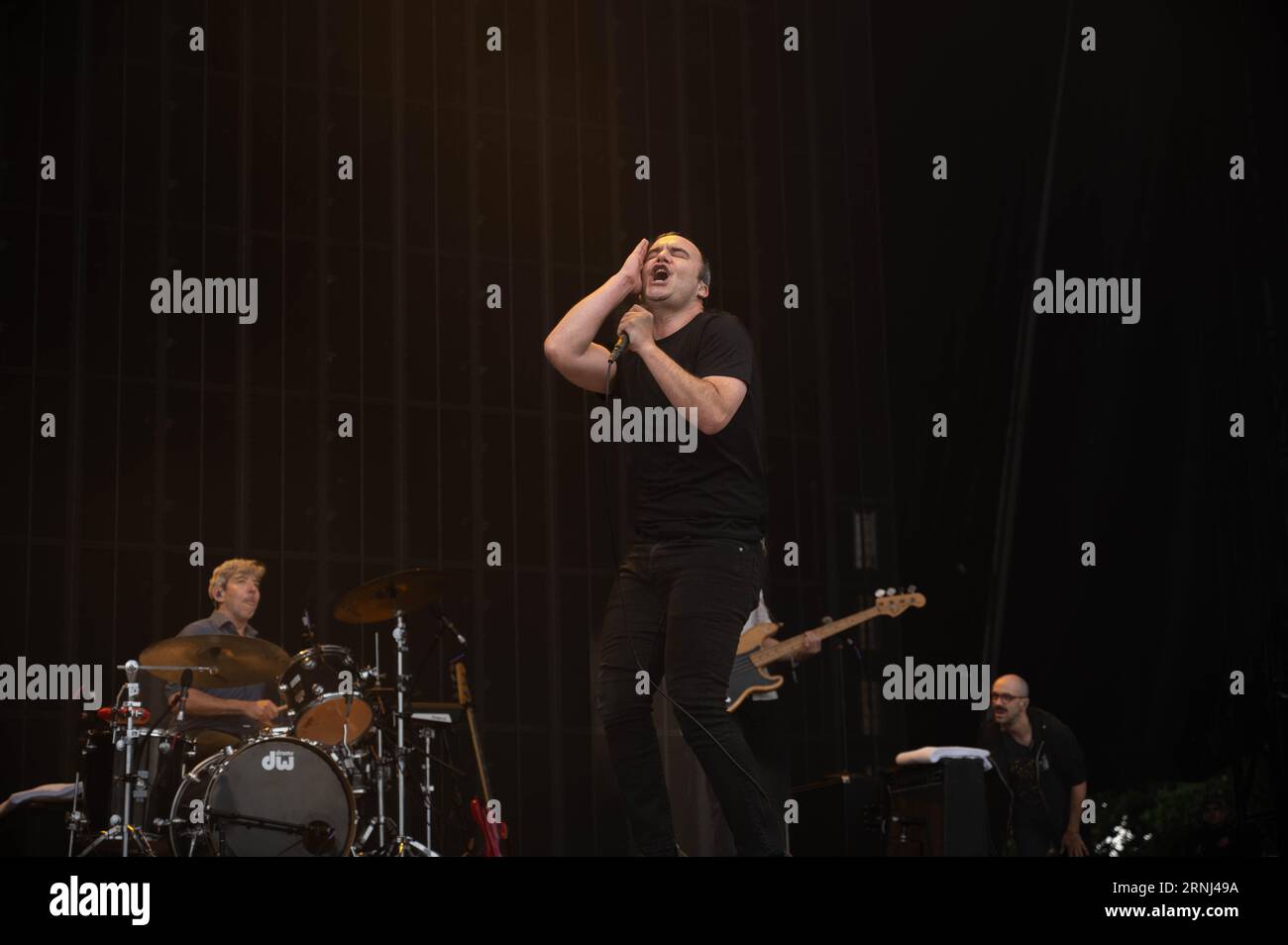 Photographs of Samuel T Herring of Future Islands performing at Connect ...