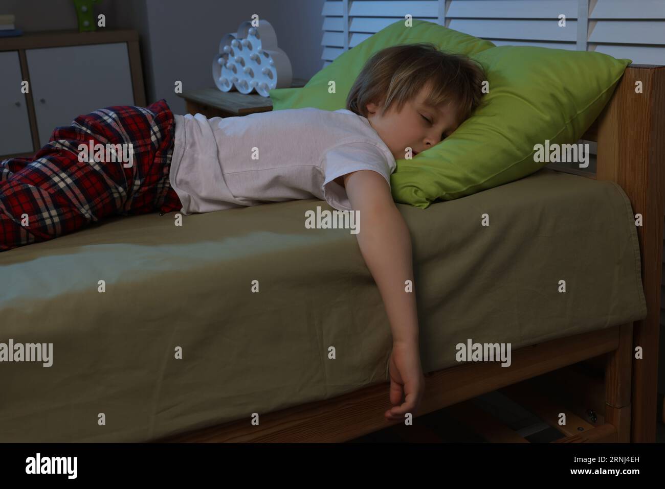 Little boy snoring while sleeping in bed at night Stock Photo - Alamy