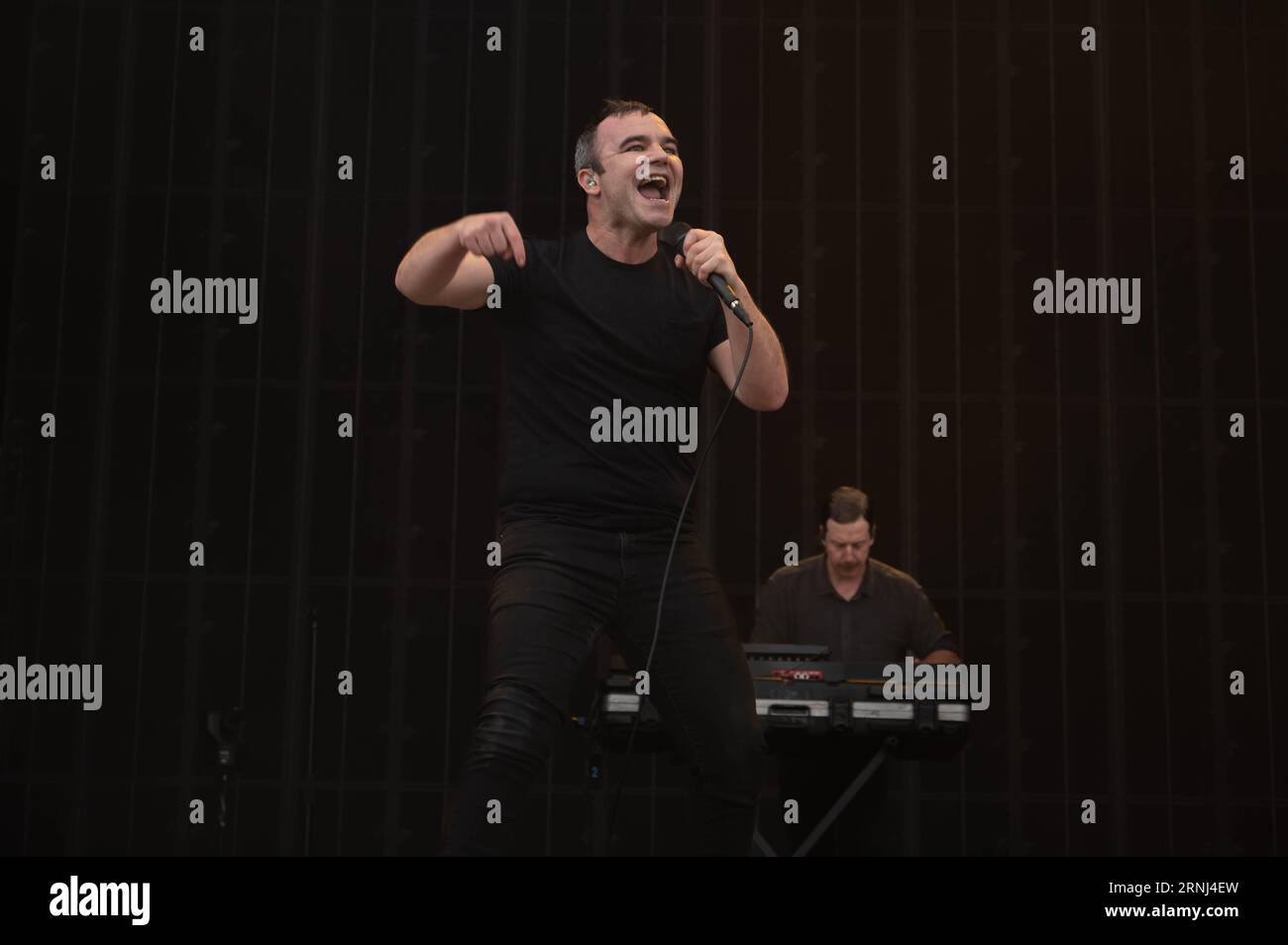 Photographs of Samuel T Herring of Future Islands performing at Connect ...