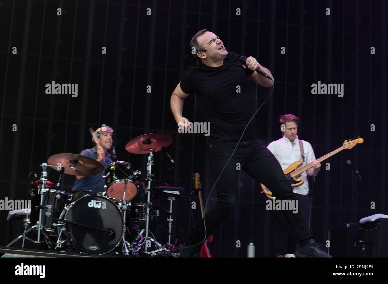 Photographs of Samuel T Herring of Future Islands performing at Connect ...