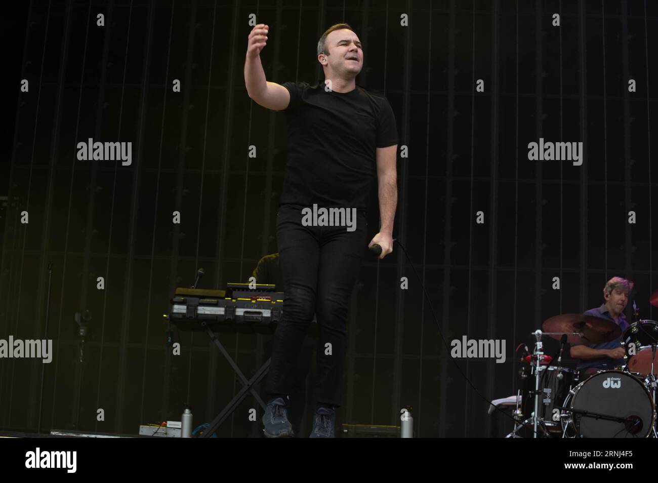 Photographs of Samuel T Herring of Future Islands performing at Connect ...