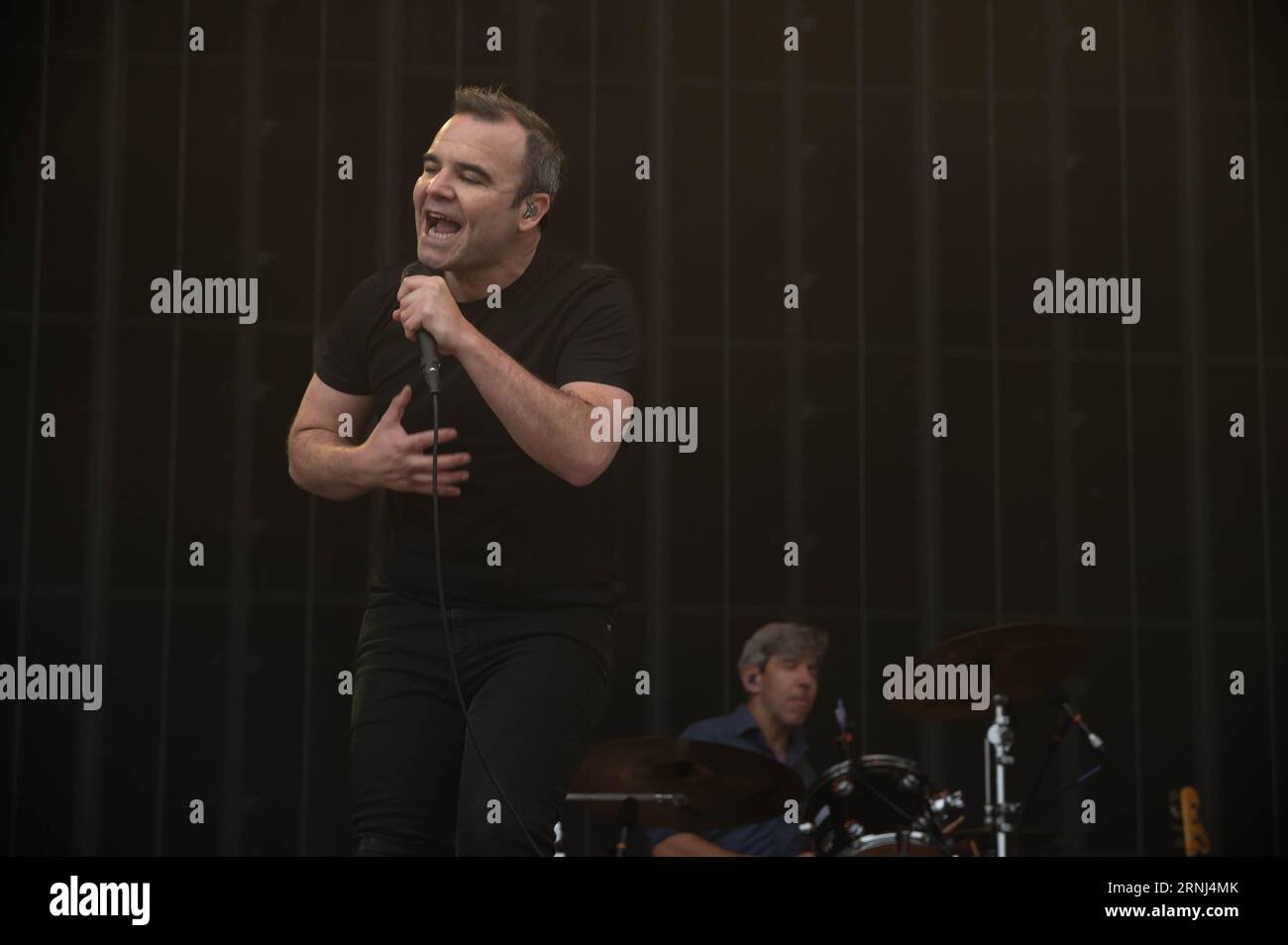 Photographs of Samuel T Herring of Future Islands performing at Connect ...