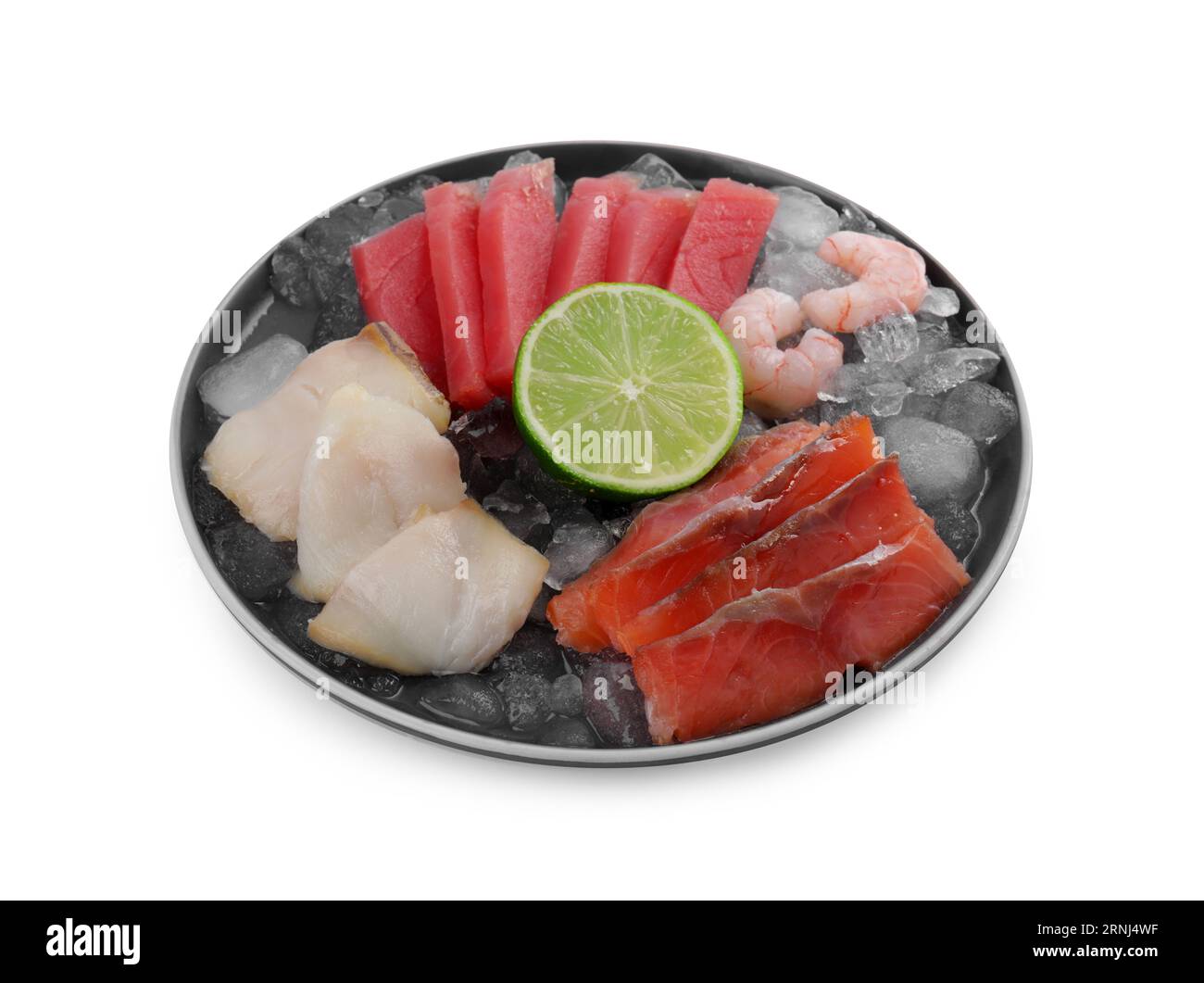 Sashimi set (raw slices of tuna, oily fish, salmon and shrimps) served ...