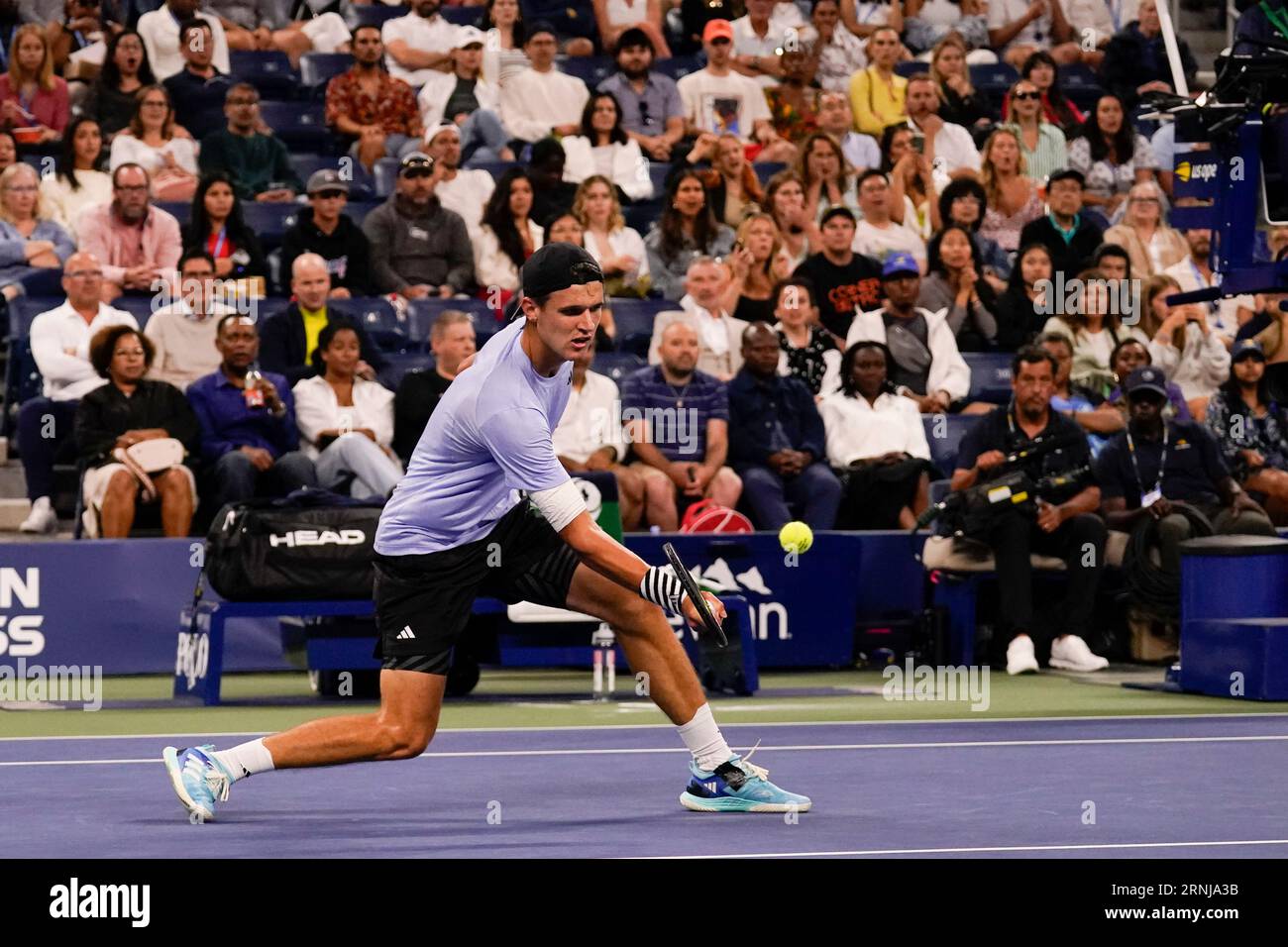 Jakub Mensik, of the Czech Republic, returns a shot to Taylor Fritz, of ... Jakub Mensik, of the Czech Republic, returns a shot to Taylor Fritz, of ...
