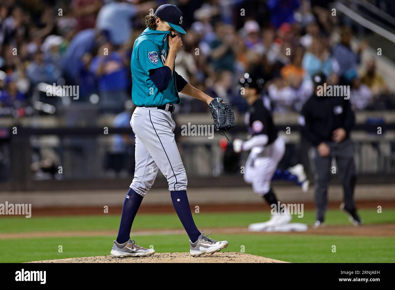 Seattle Mariners pitcher Logan Gilbert reacts after giving up a home ...