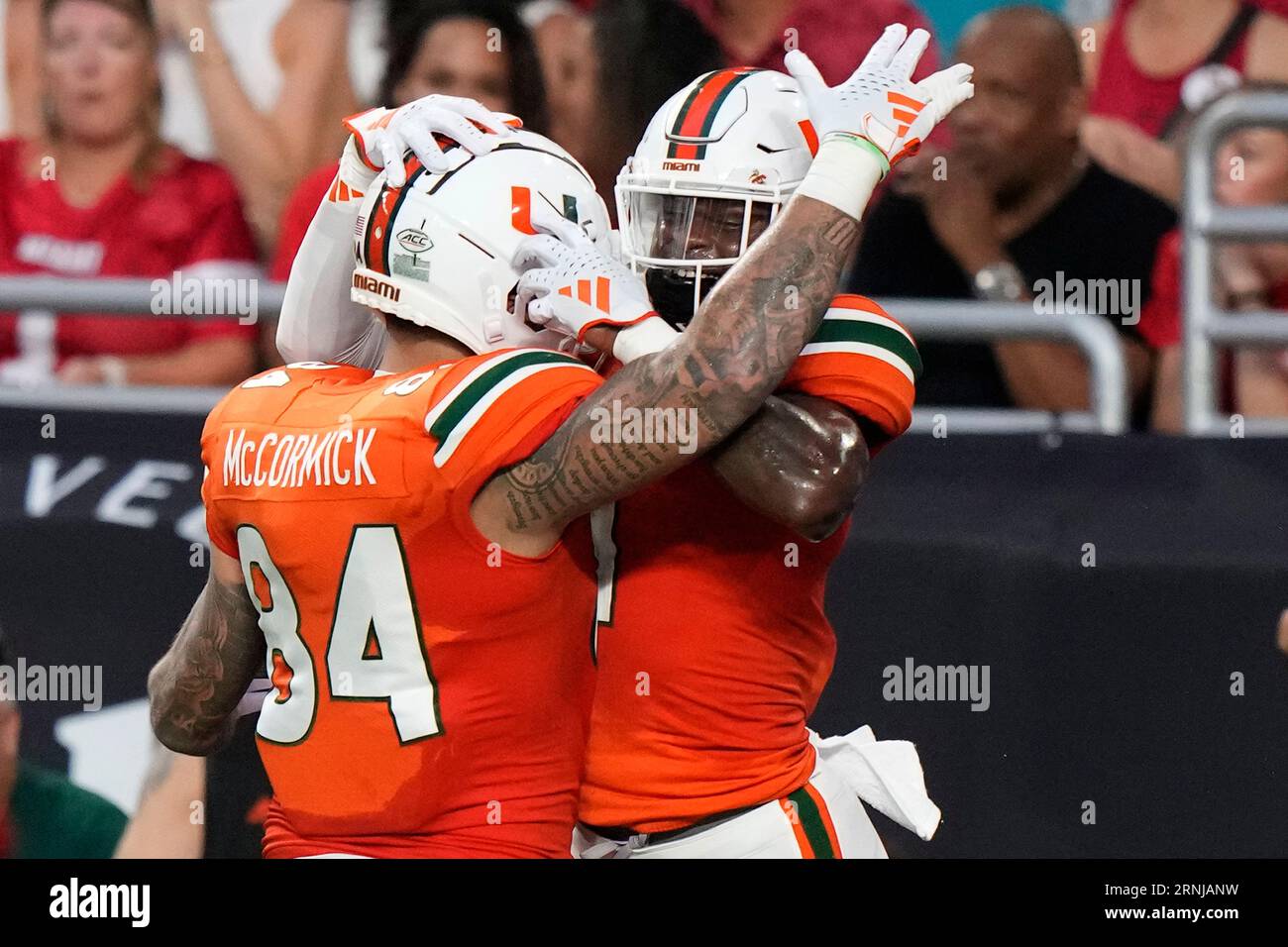 Miami wide receiver Colbie Young, right, celebrates his touch down run ...