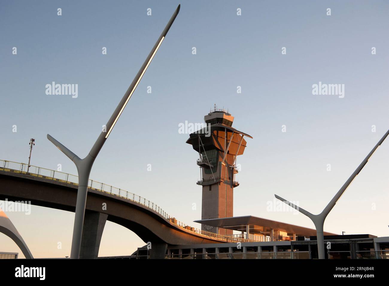 Newly installed tracks for the Metro Rail line passing a flight control ...
