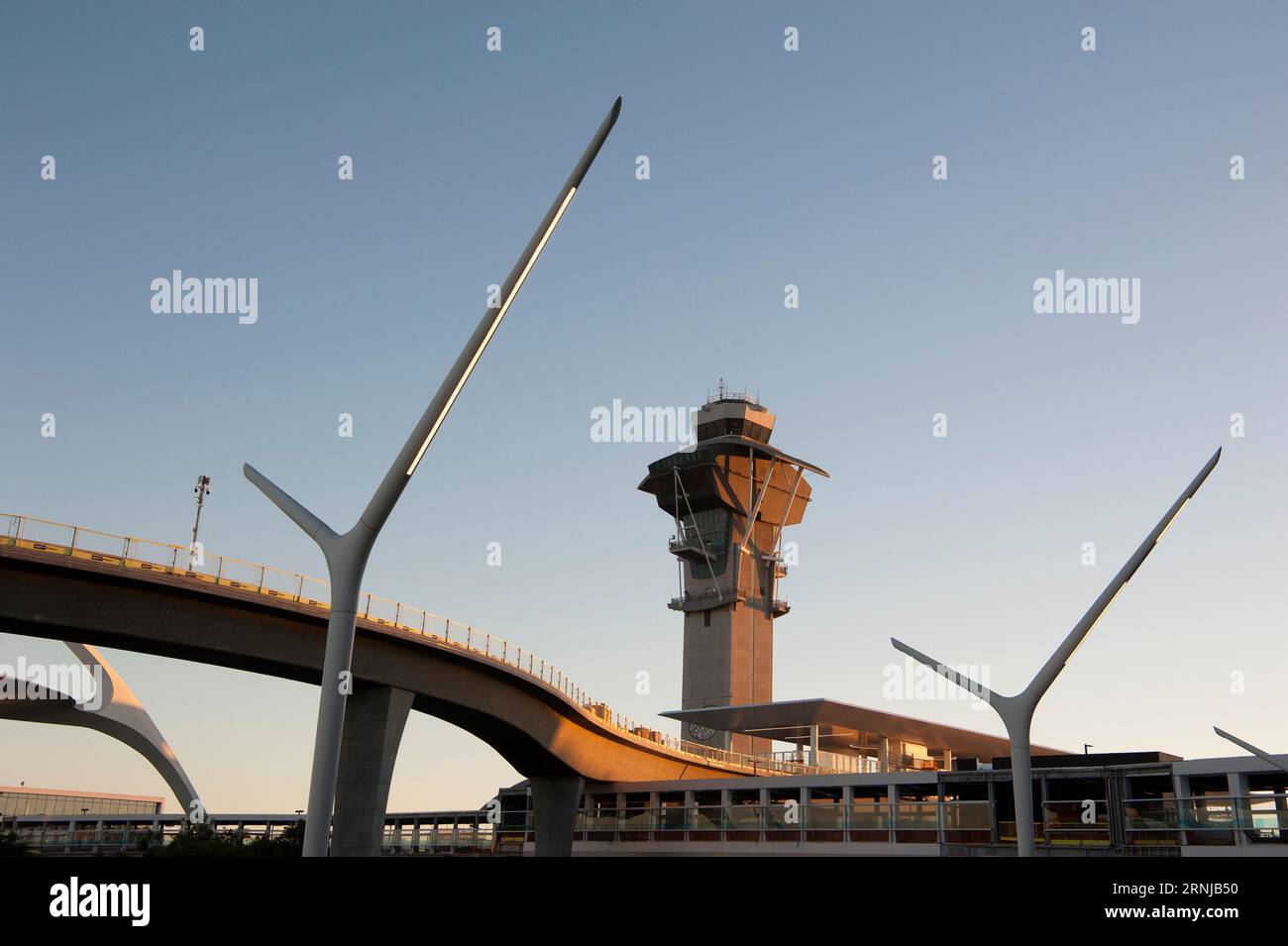 Newly installed tracks for the Metro Rail line passing a flight control ...