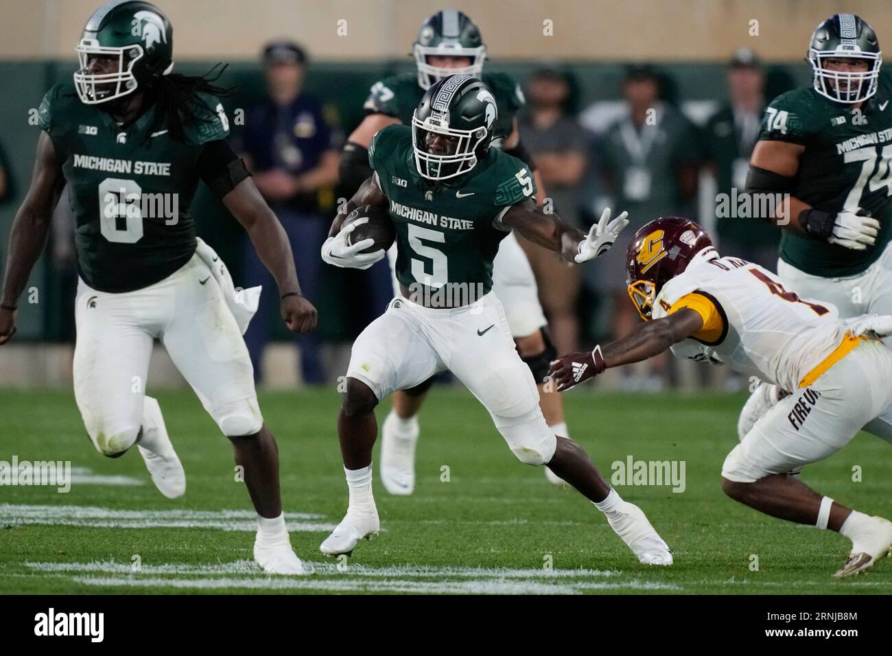 Michigan State running back Nathan Carter (5) rushes during the first ...