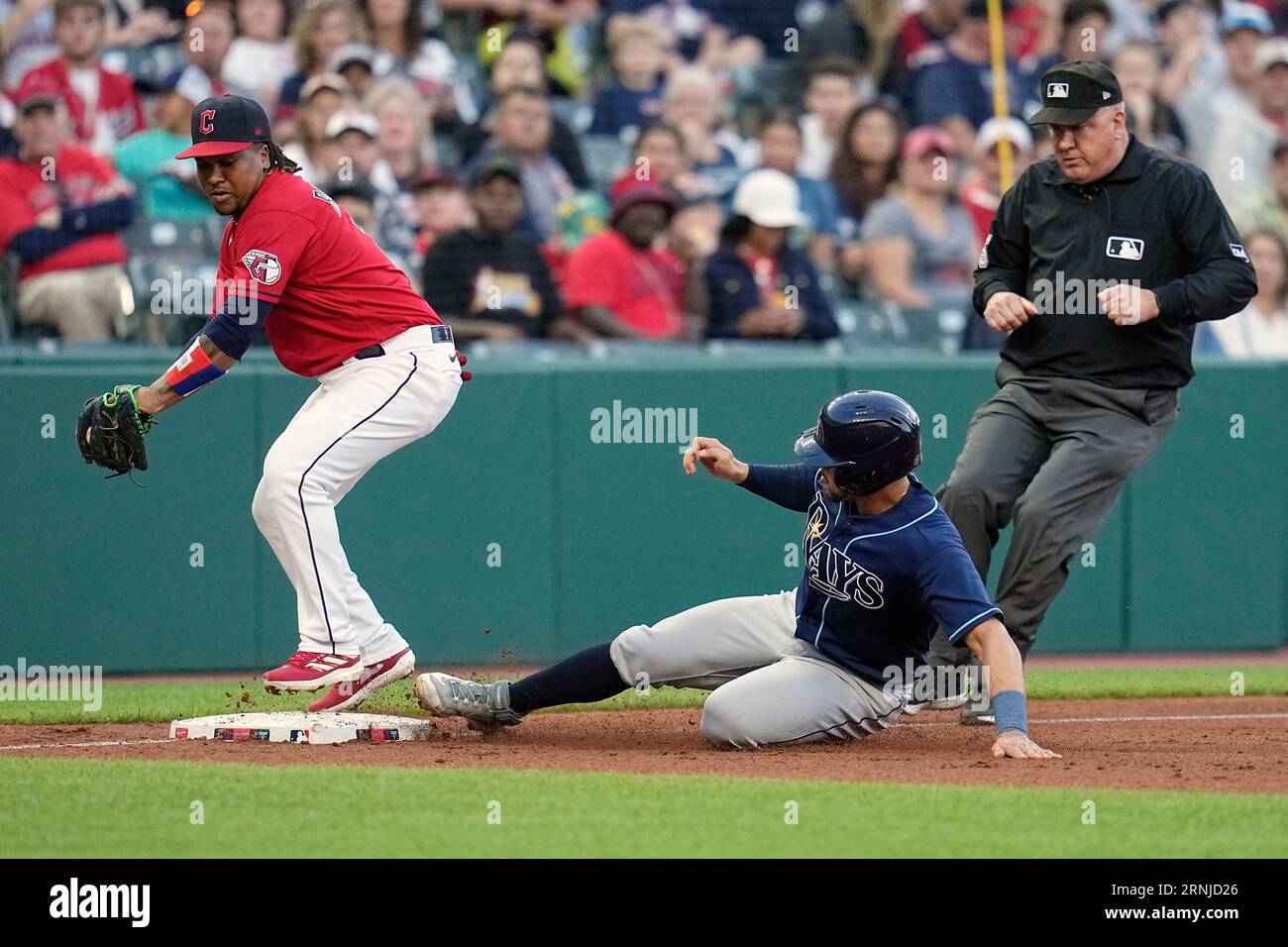 Tampa Bay Rays' Rene Pinto advances to third base next to Cleveland ...