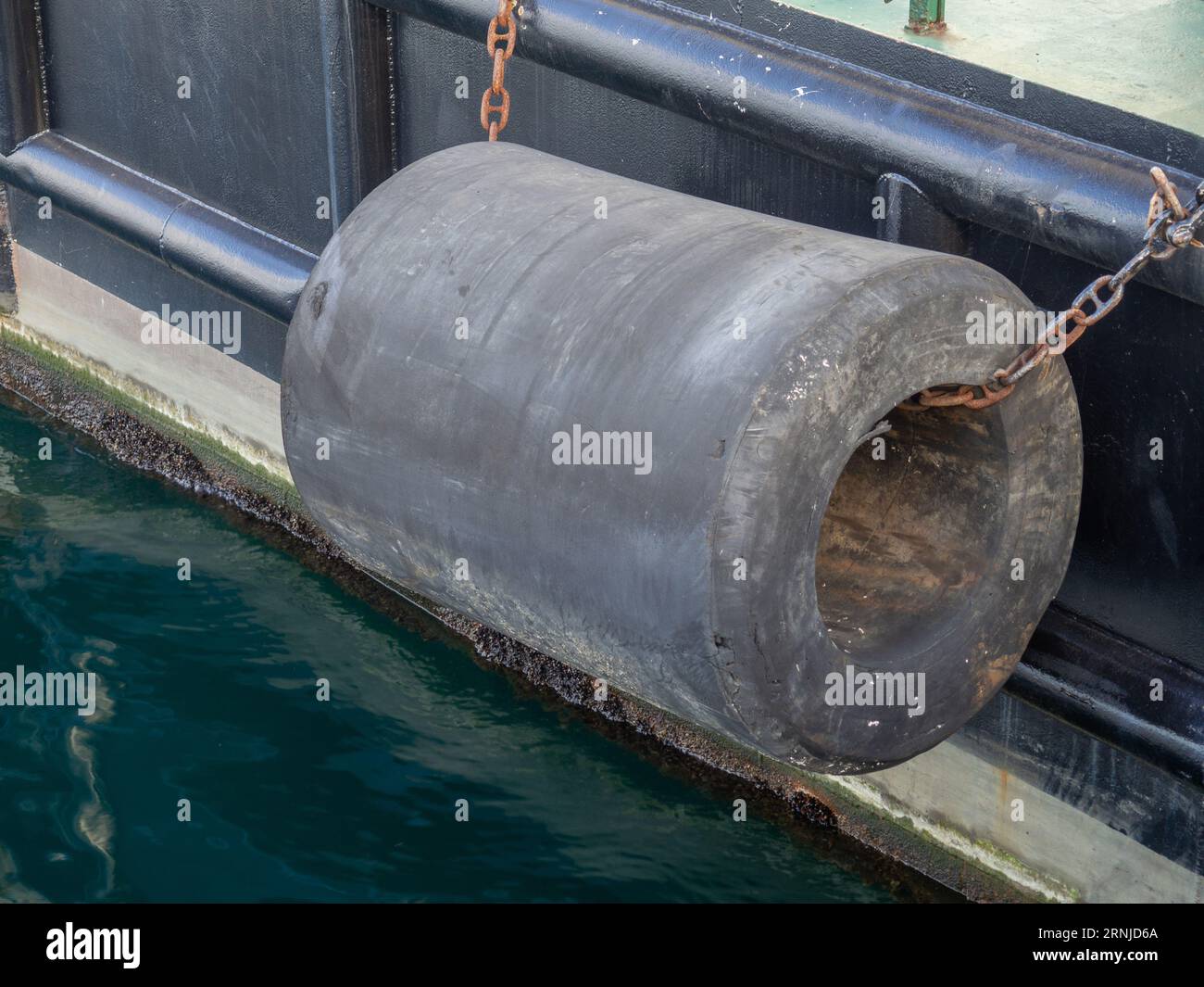 Rubber protecting the pier. Navigation safety concept. Shock-absorbing ...