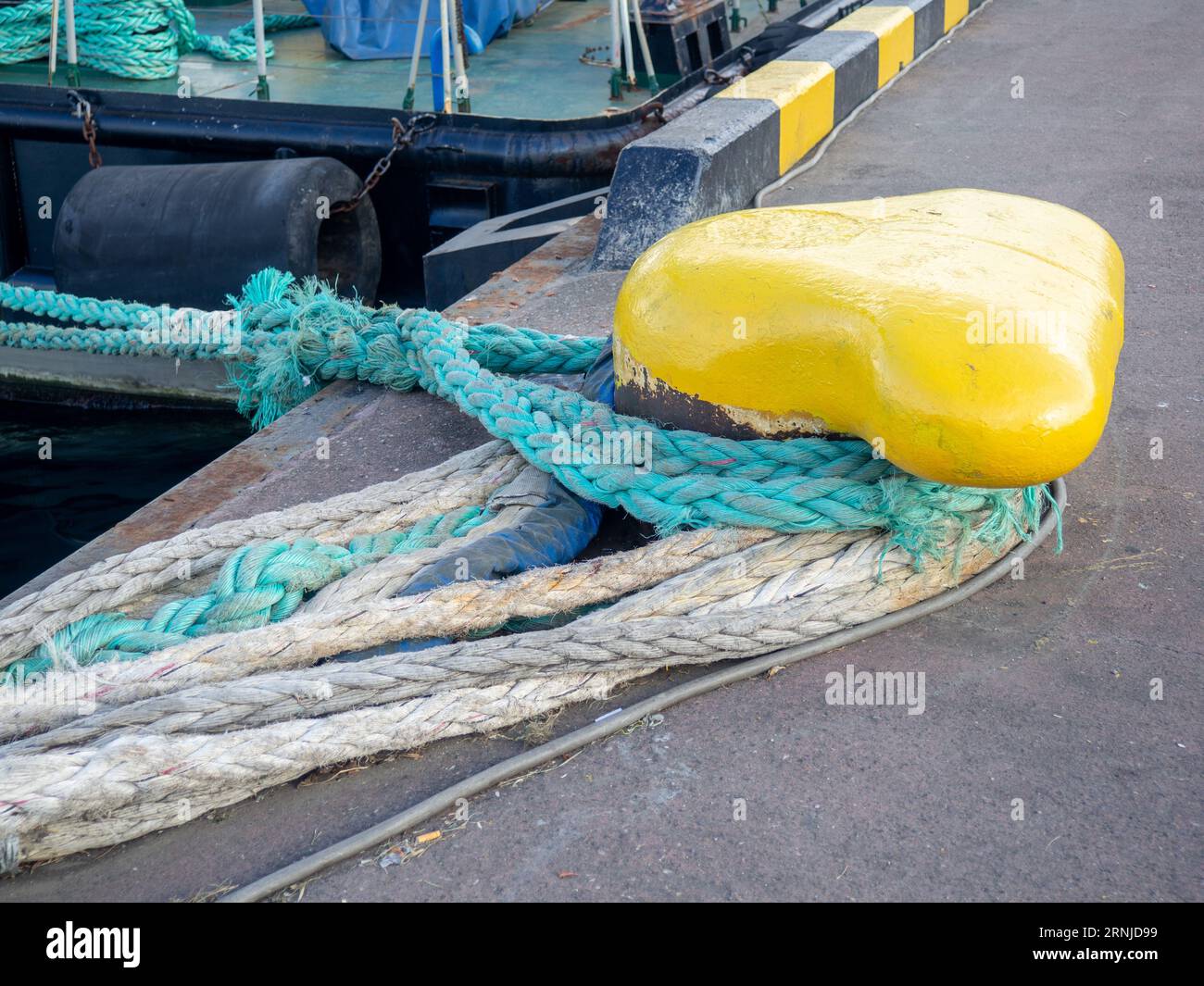 Mooring tied to the bollard. Maritime business. The concept of the ship ...