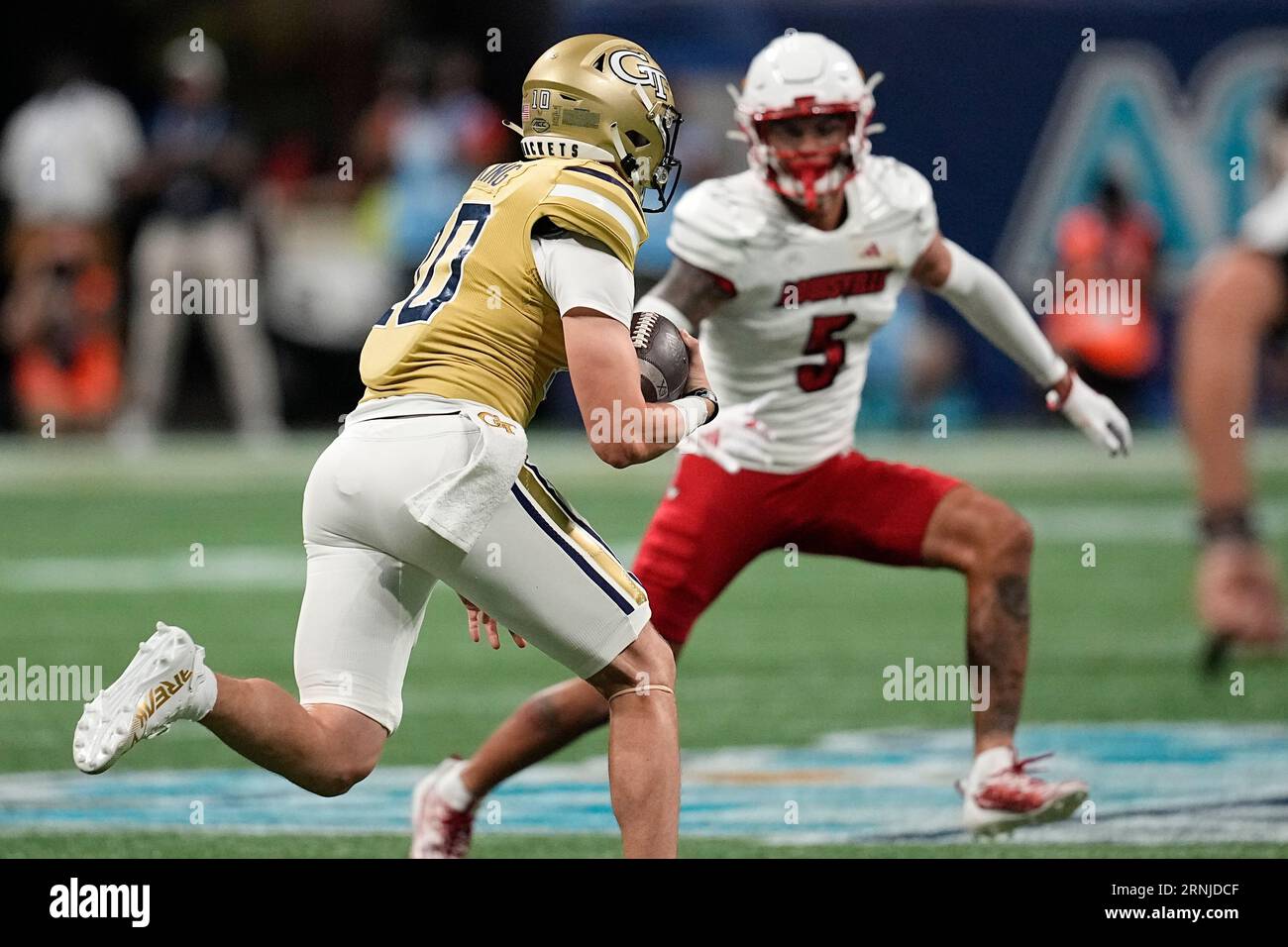 Georgia Tech quarterback Haynes King (10) runs against Louisville ...