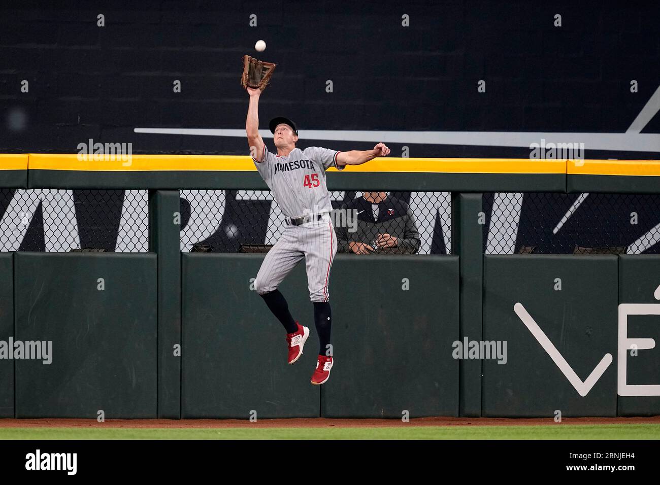 Minnesota Twins center fielder Andrew Stevenson makes a leaping catch ...
