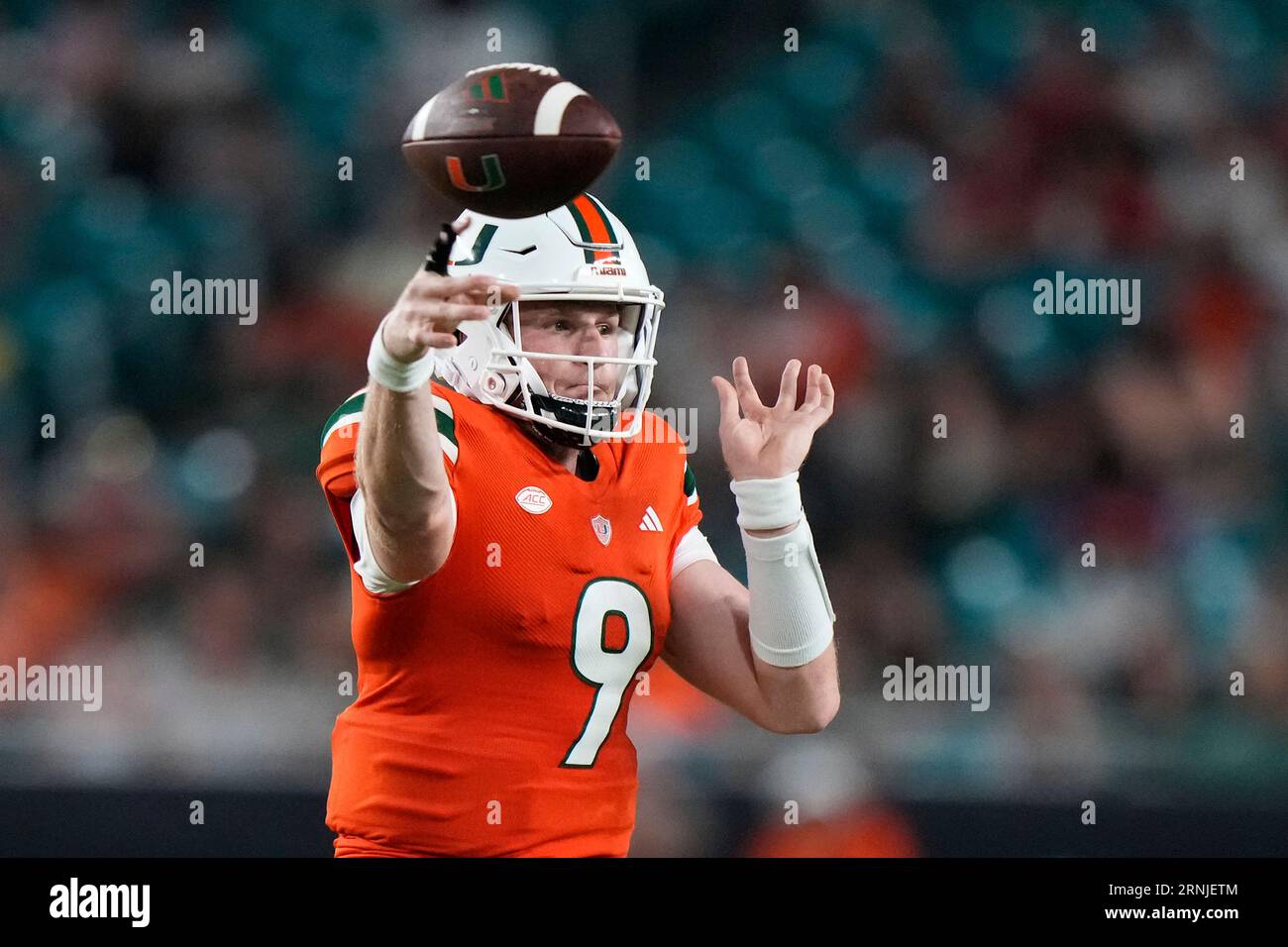 Miami quarterback Tyler Van Dyke passes the ball during the first half ...