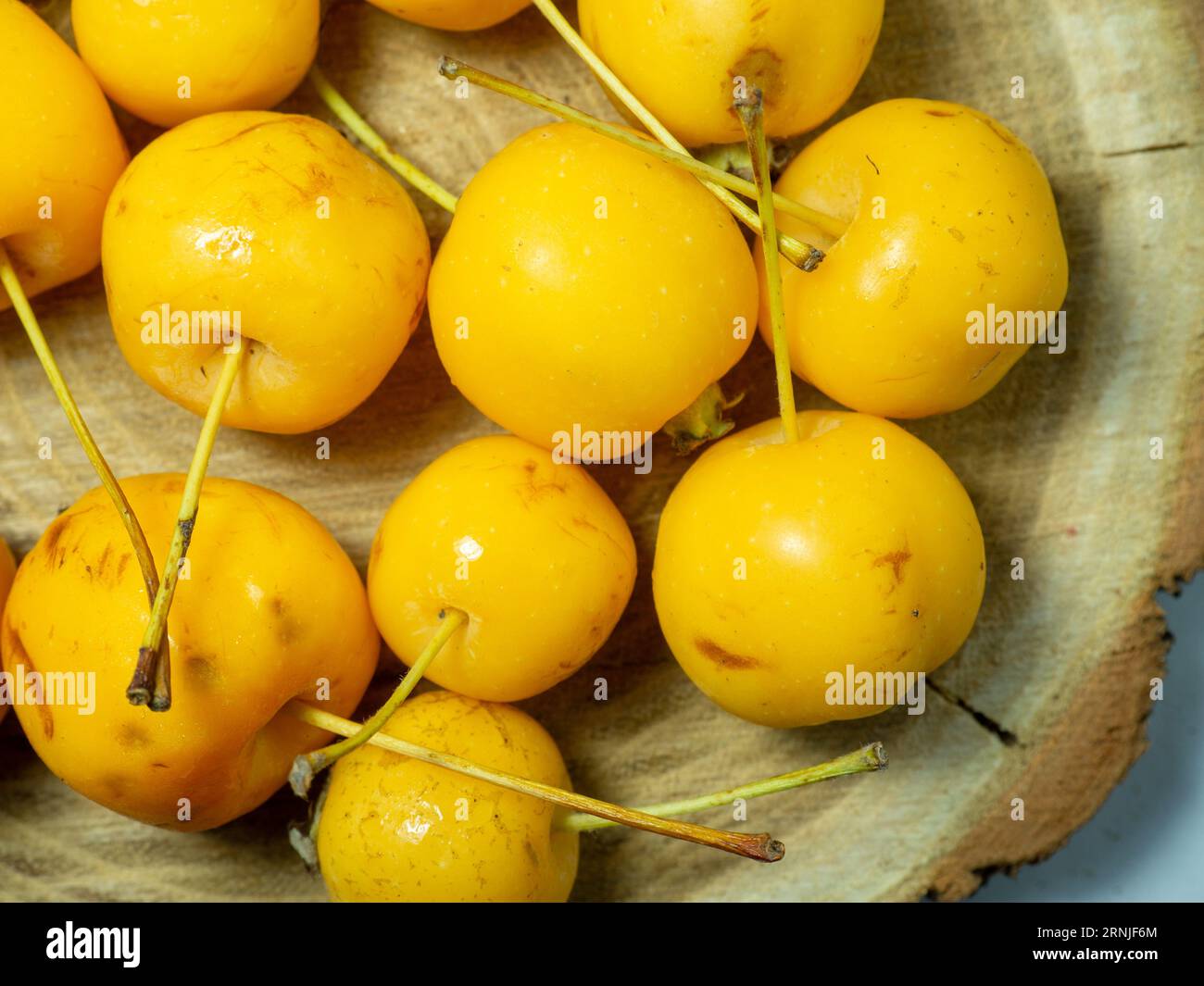 Chinese apples. Yellow small apples. early fruit on a white background ...